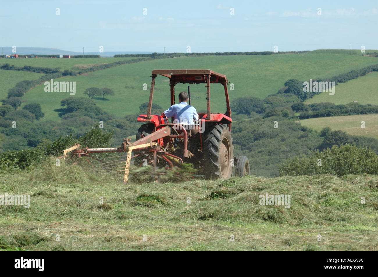 Turning hay hi-res stock photography and images - Alamy