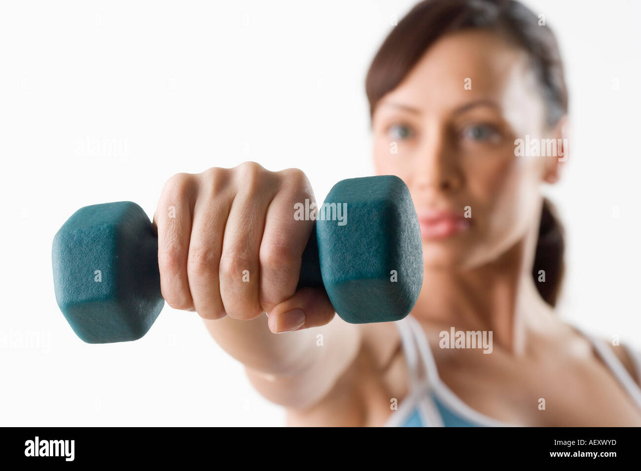 Woman holding hand weight Stock Photo - Alamy