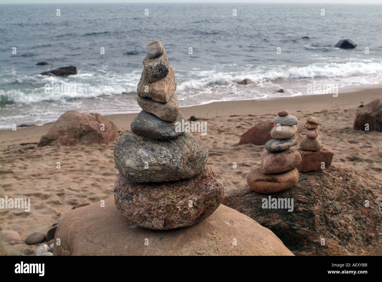 Cairns or stacked and piled rocks on a beach Stock Photo - Alamy