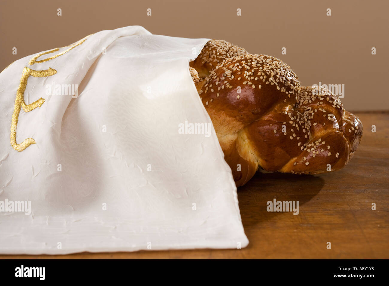Loaf of Challah bread under cloth Stock Photo - Alamy