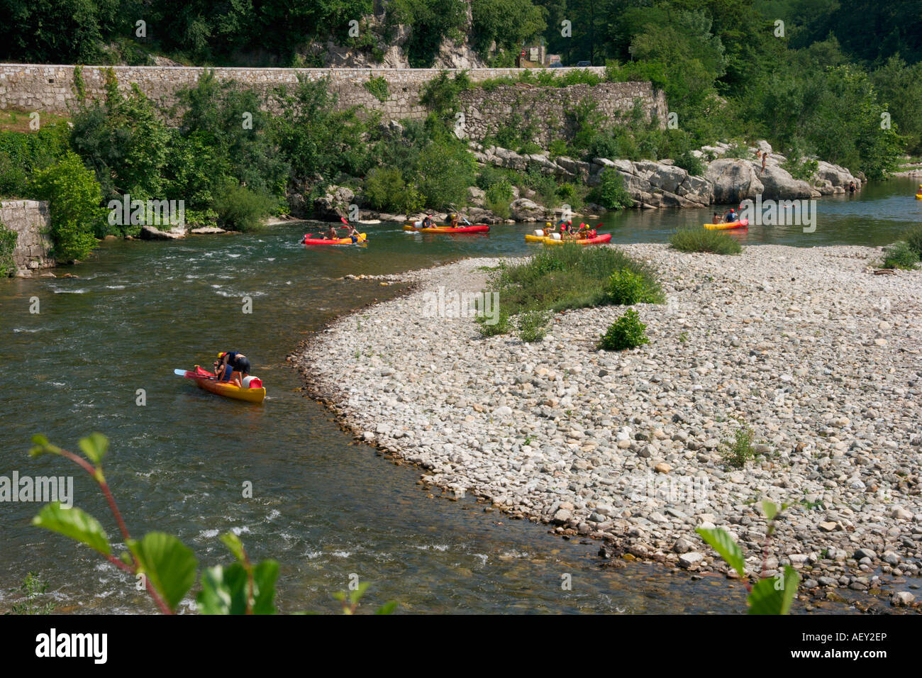 Tourists canoeing on the l’herault river, Languedoc Roussillon. The ...