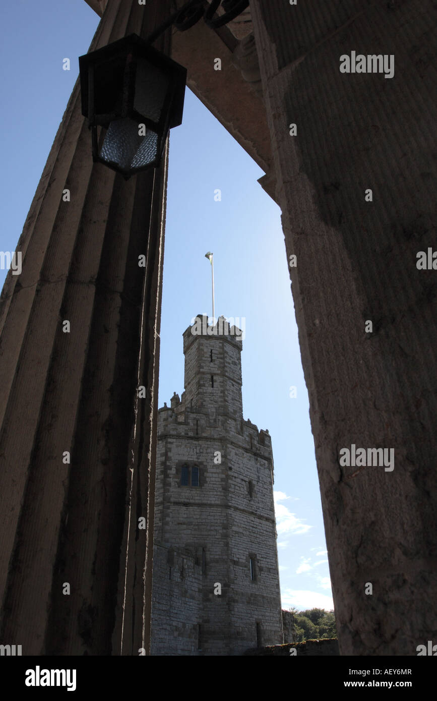 Caernarfon Castle on the Menai Straits viewed through the pillars of ...