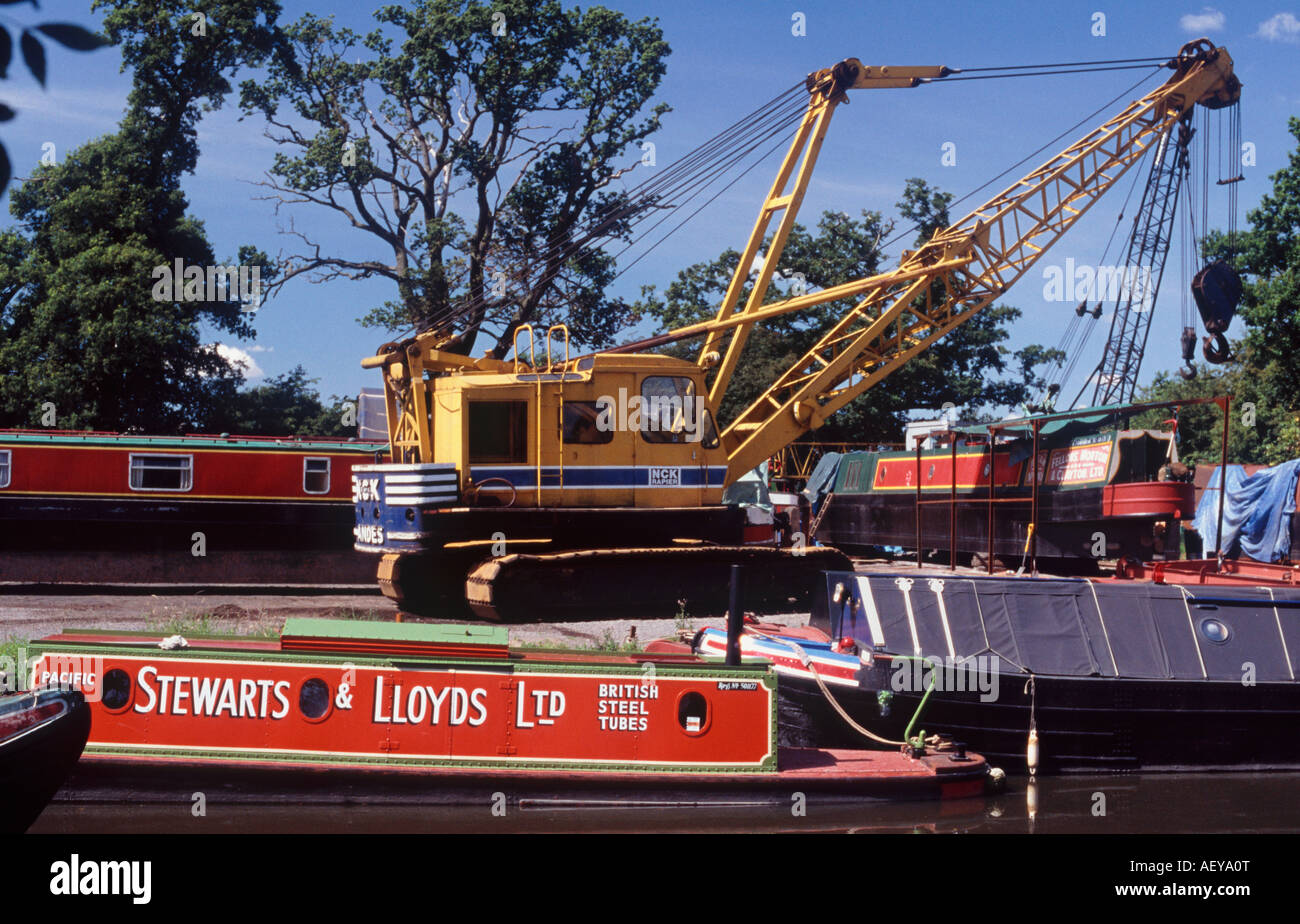 Boatyard on Shropshire Union Canal with crane surrounded by classic ...