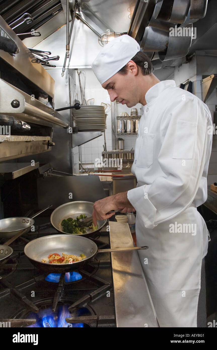 Male chef in restaurant kitchen Stock Photo - Alamy