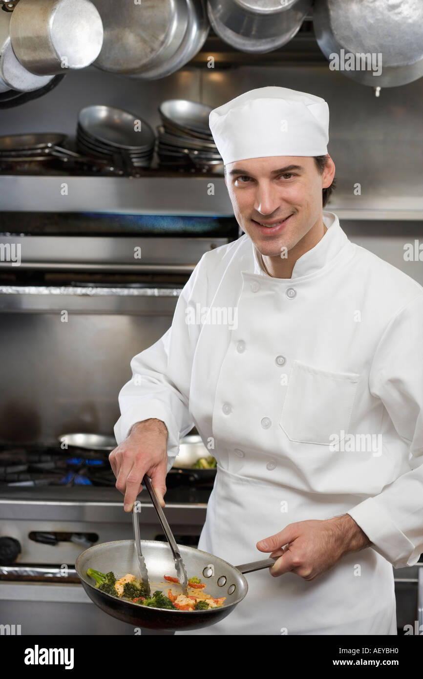 Male chef in restaurant kitchen Stock Photo - Alamy