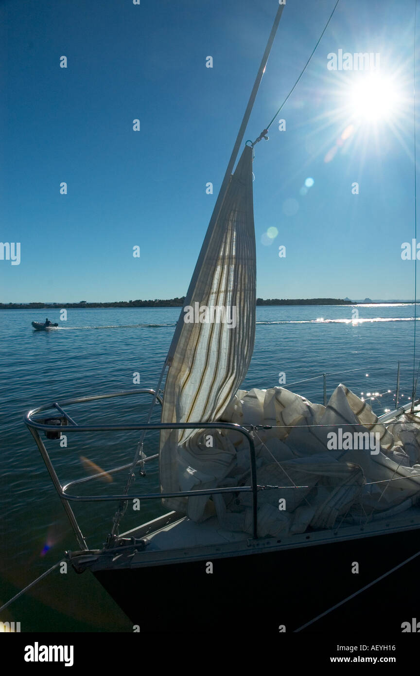 furled foresail on yacht Stock Photo - Alamy