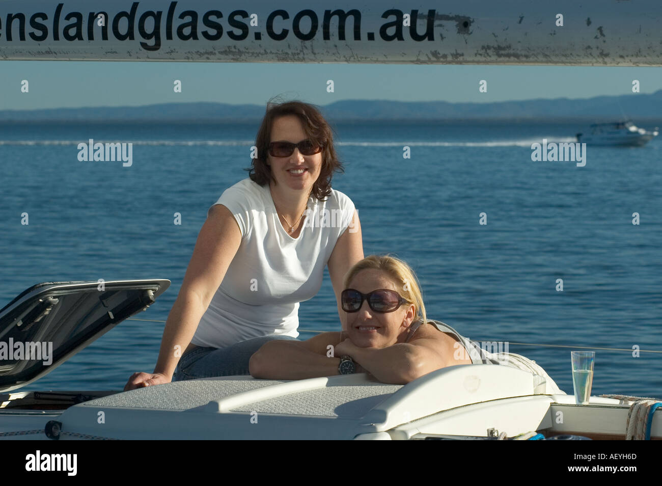friends chill out on Yacht Stock Photo - Alamy