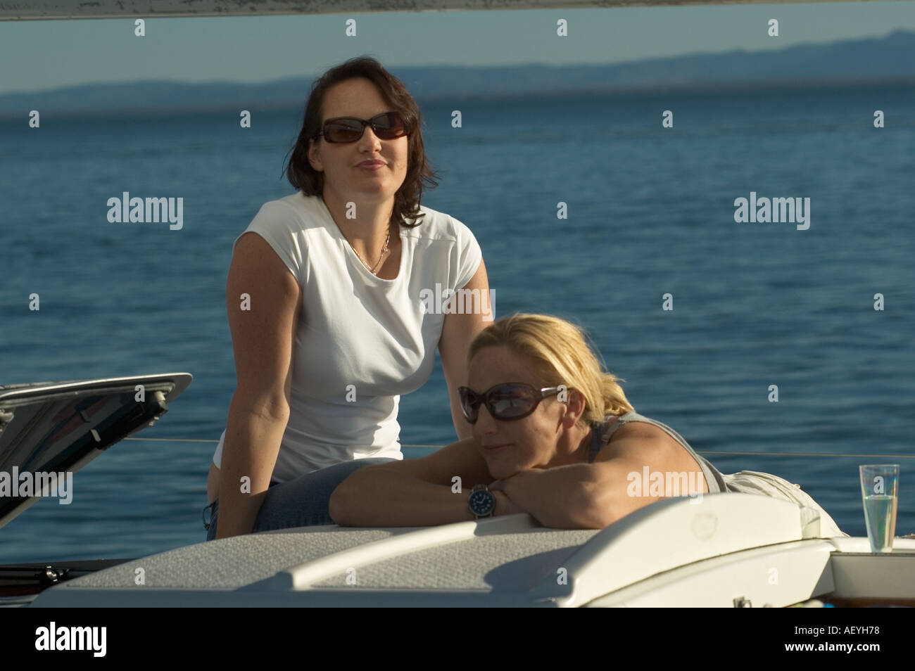 friends chill out on Yacht Stock Photo - Alamy