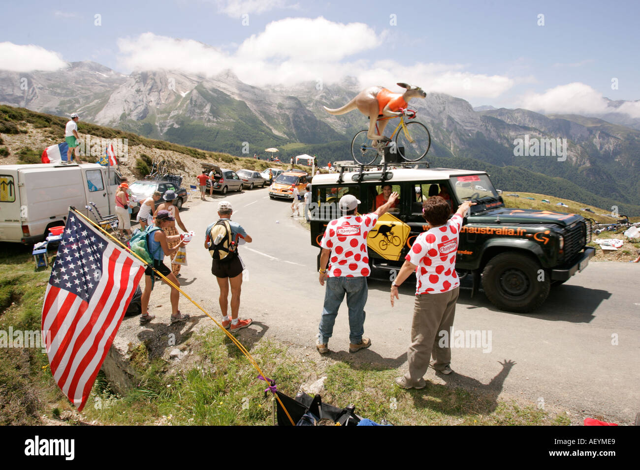 Tour de France spectators hunt for freebies from the Tour cavalcade on ...