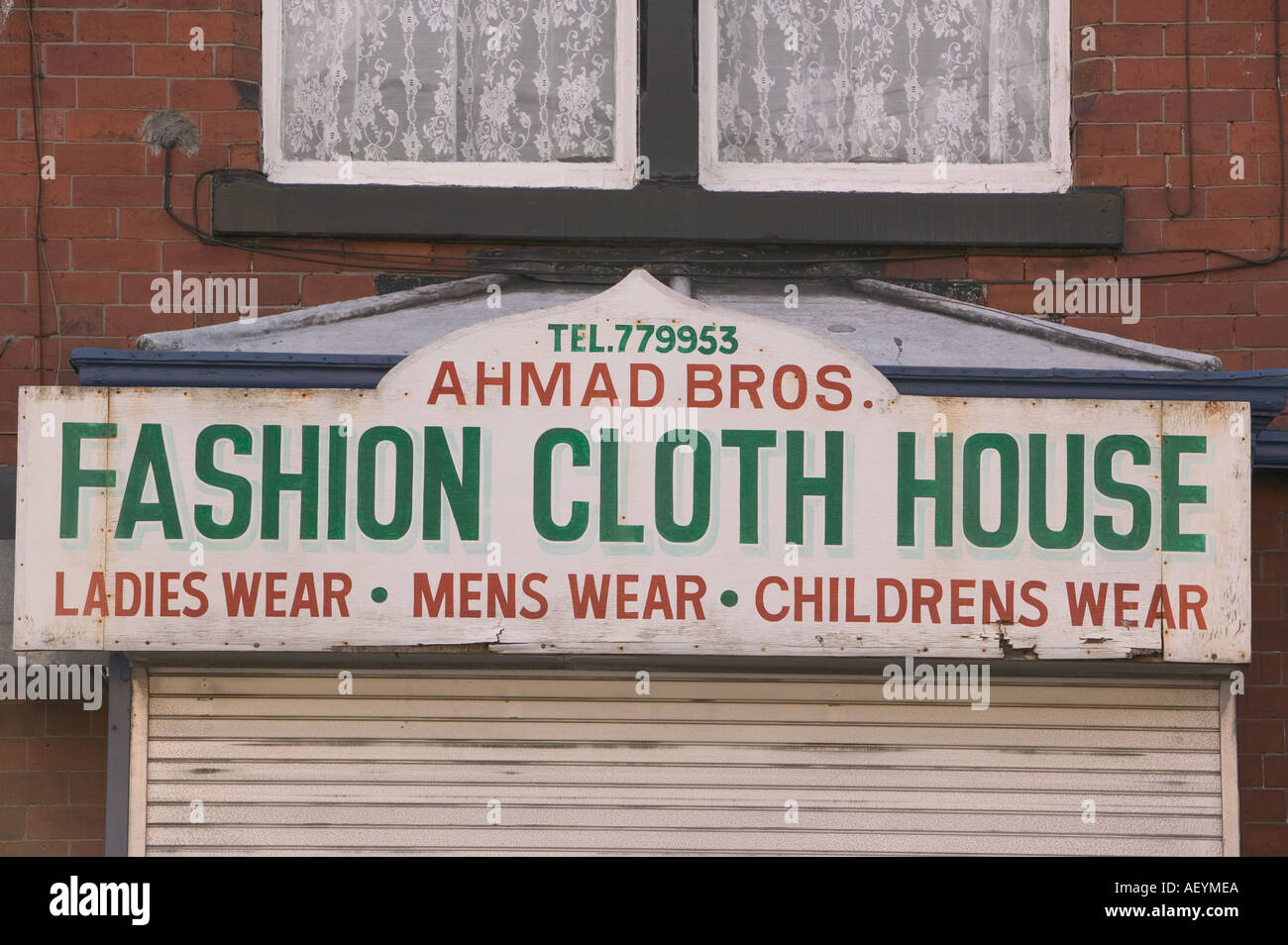 shop front in the Asian area of Beeston Leeds a run down impoverished ...