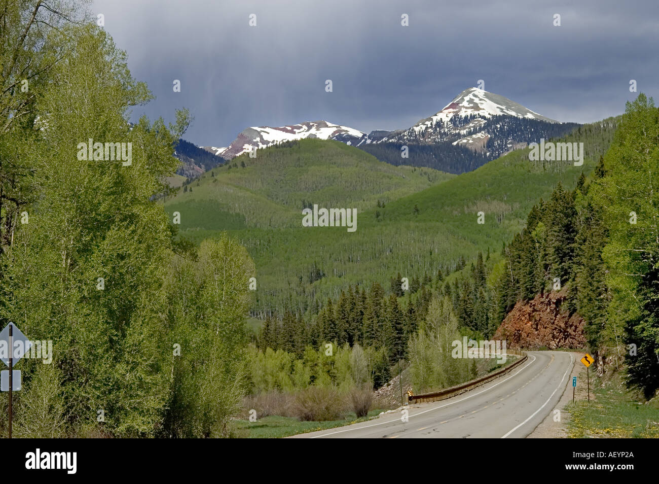 Highway 145 winds through spring time as it spreads over the Rocky ...