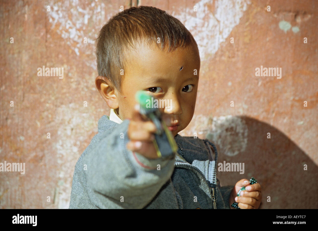 Tibetan Sniper Kid Stock Photo - Alamy