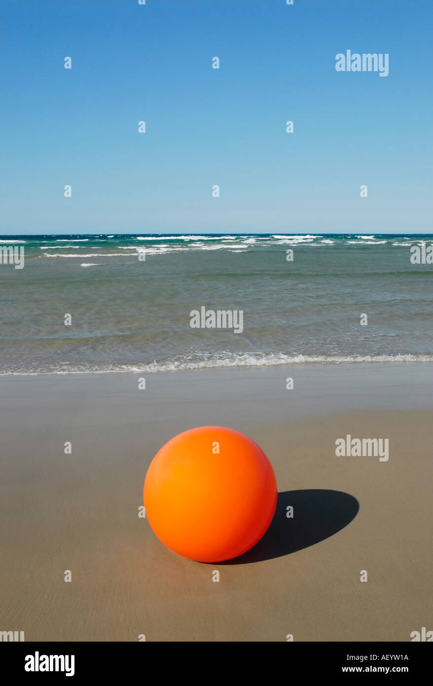 Beach ball solitude Stock Photo - Alamy