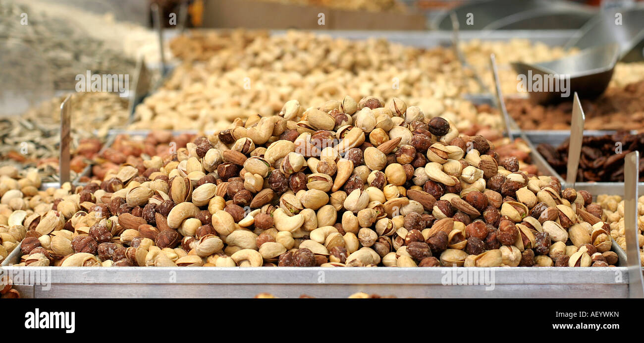 mixed nuts on display in market Stock Photo - Alamy