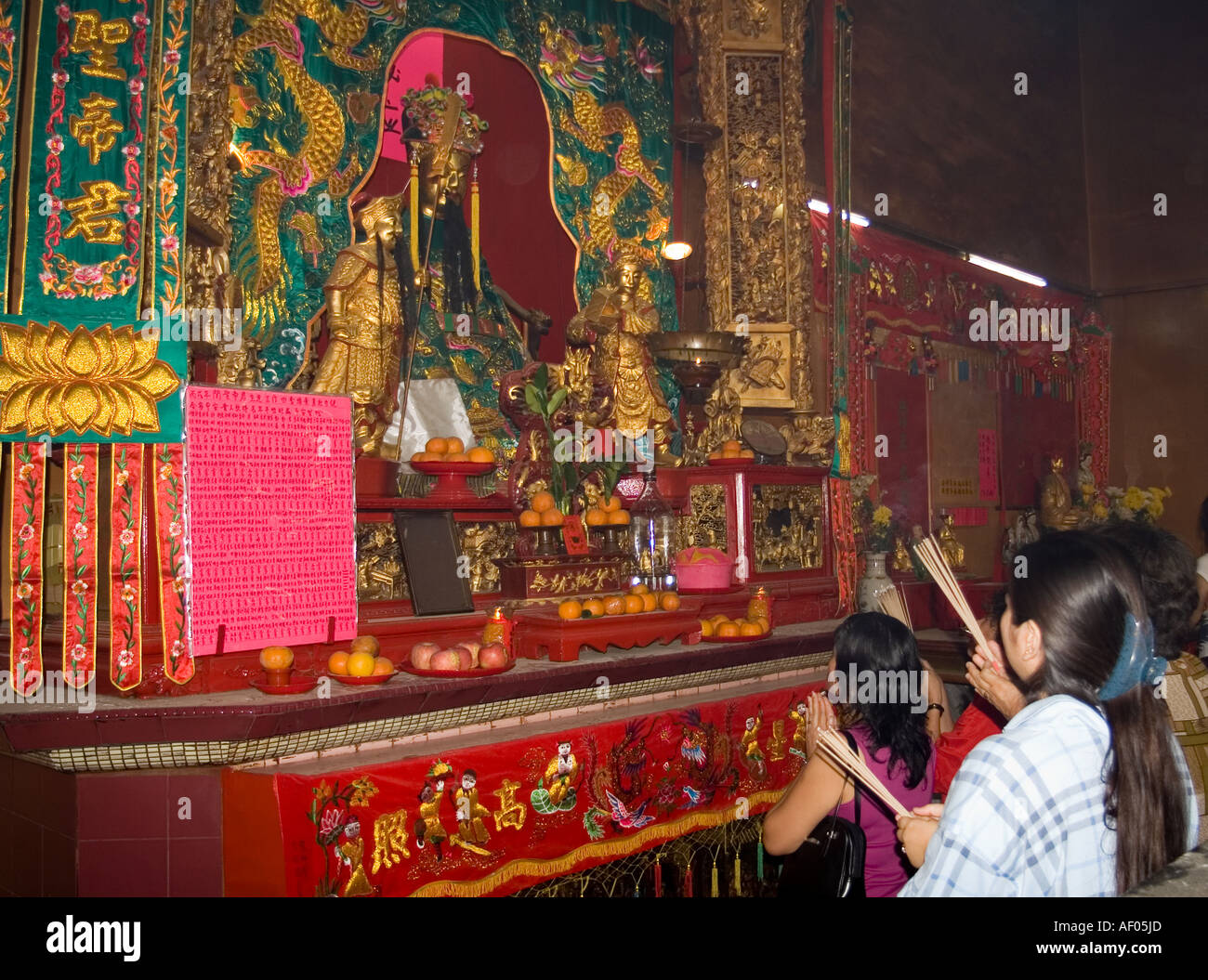 Chinese worshippers offering prayers during the Chinese Lunar New Year ...