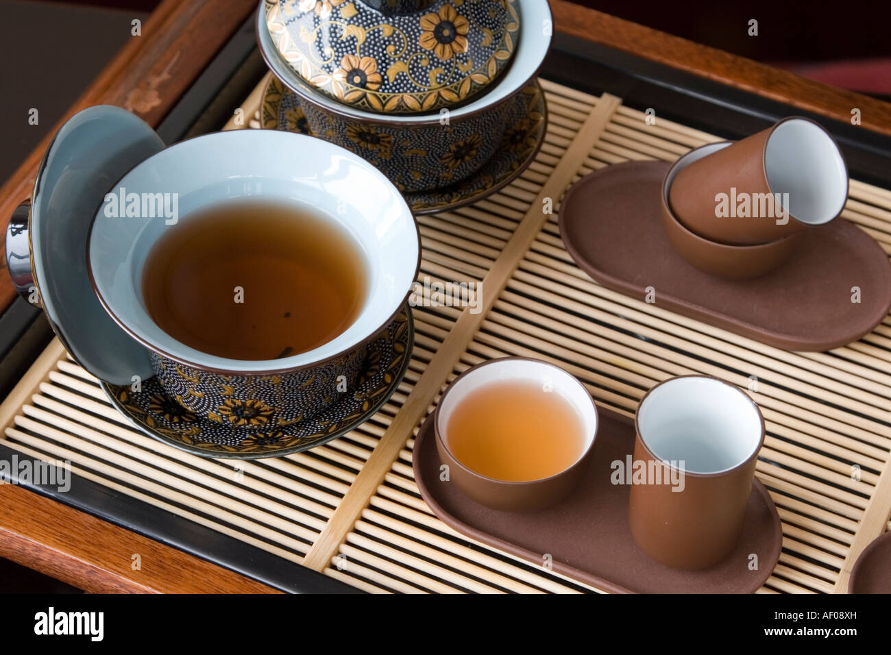 Tea served in traditional style in a modern and upscale teahouse in ...