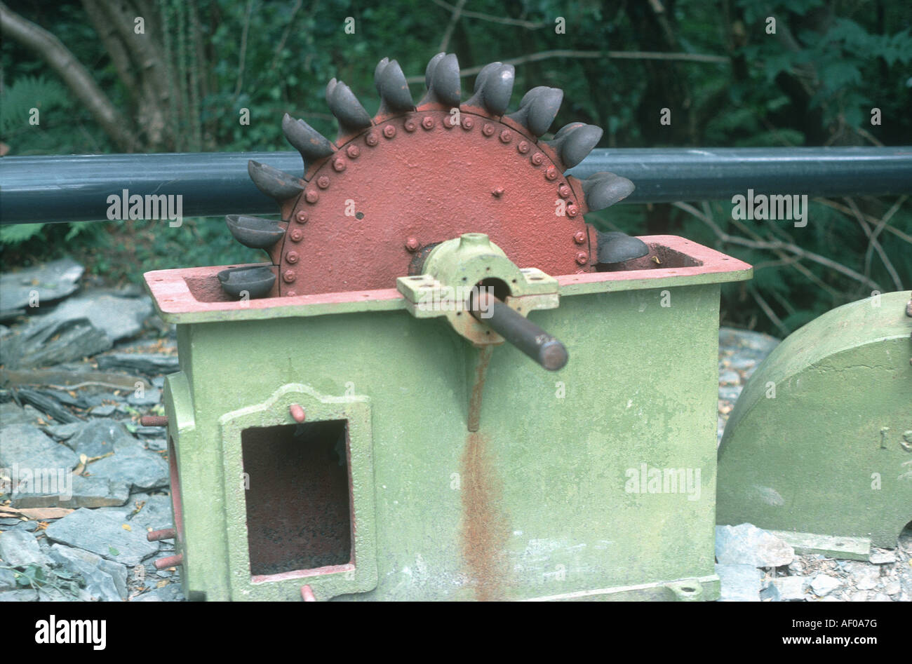 Small Pelton wheel hydro turbine CAT Mid Wales UK Stock Photo - Alamy