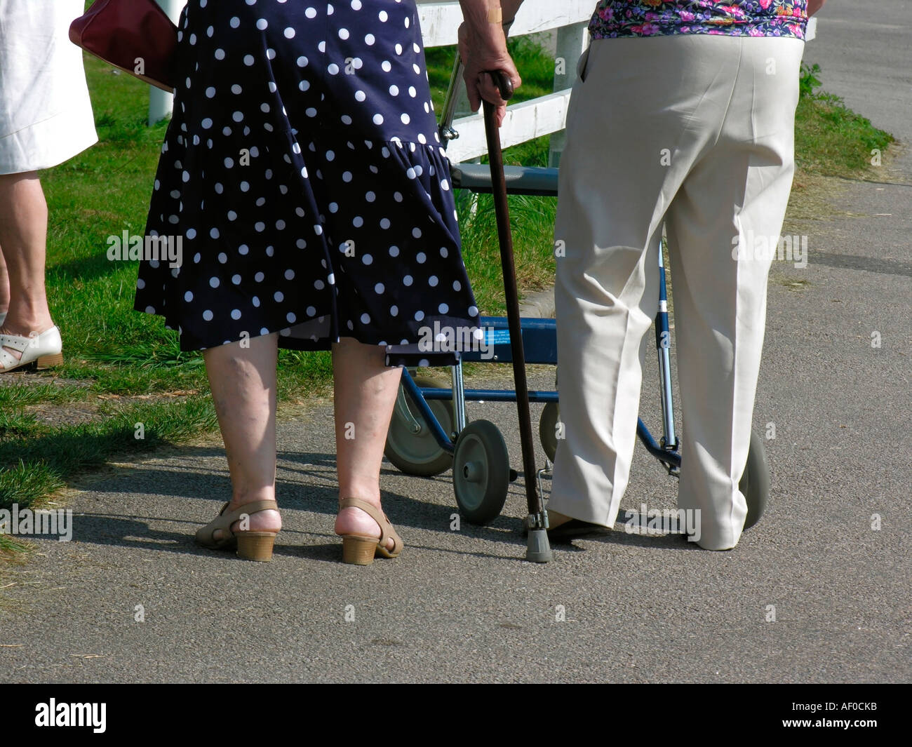 60 years old woman walking stick hi-res stock photography and images ...