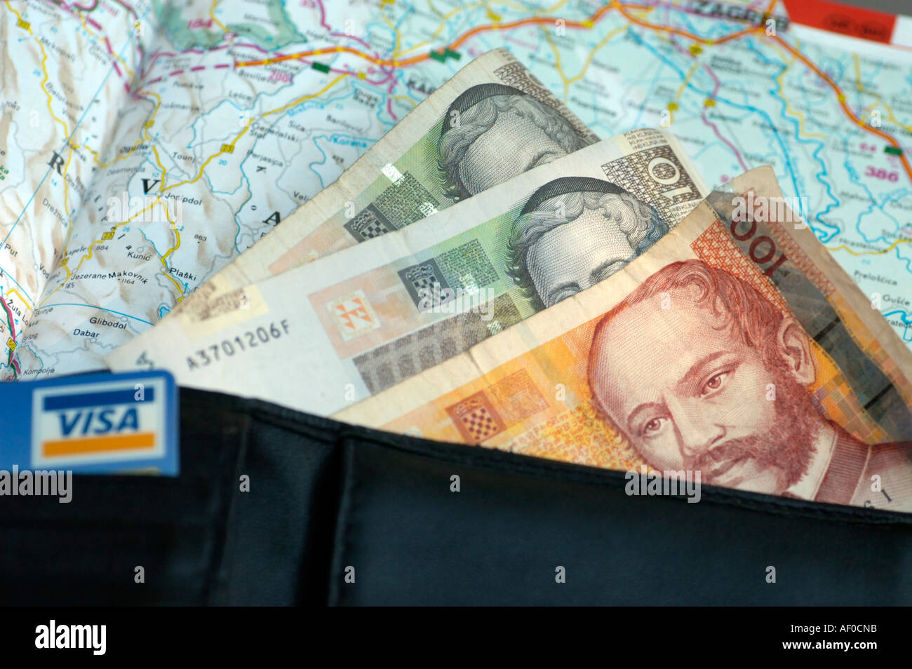 Croatian money currency Kuna in a purse portemonnaie with a Visa card ...
