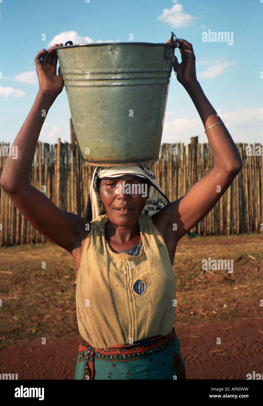 Woman with a water bucket in Kondoa, Africa Stock Photo - Alamy