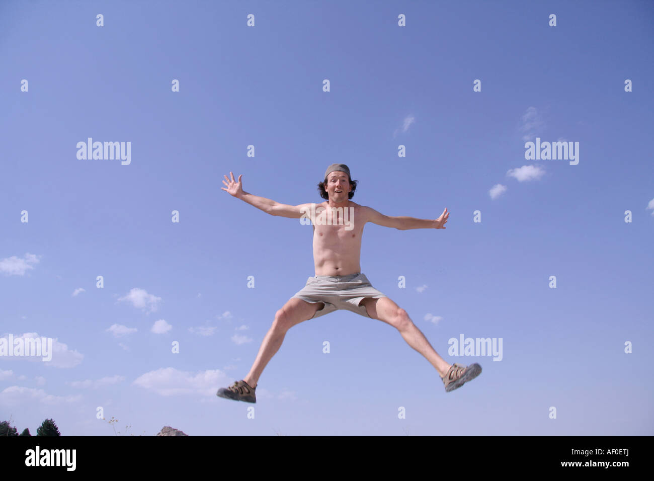 healthy happy man jumping in joy of life Stock Photo - Alamy