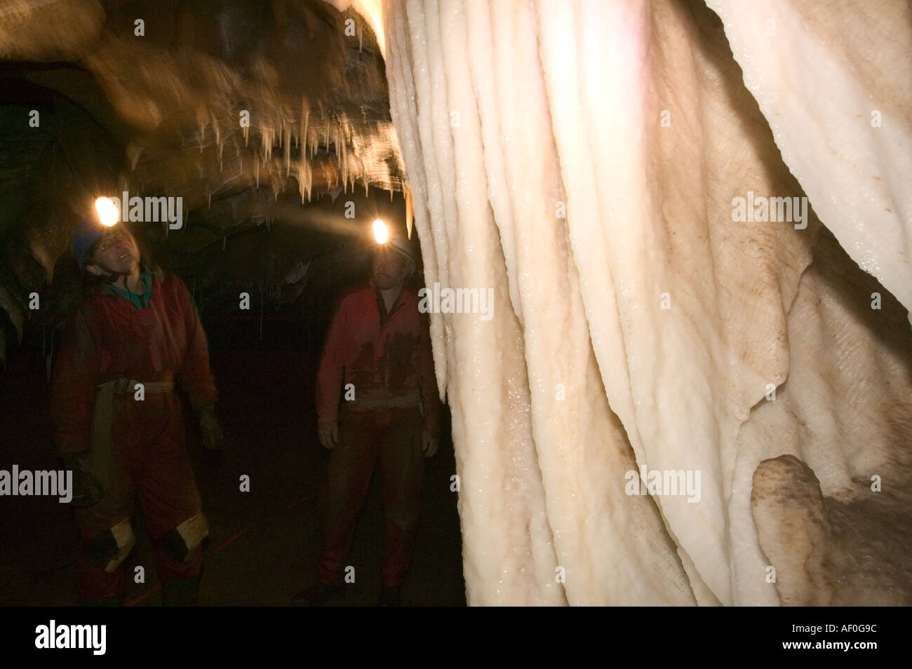 Woman caving spelunking cave hi-res stock photography and images - Alamy