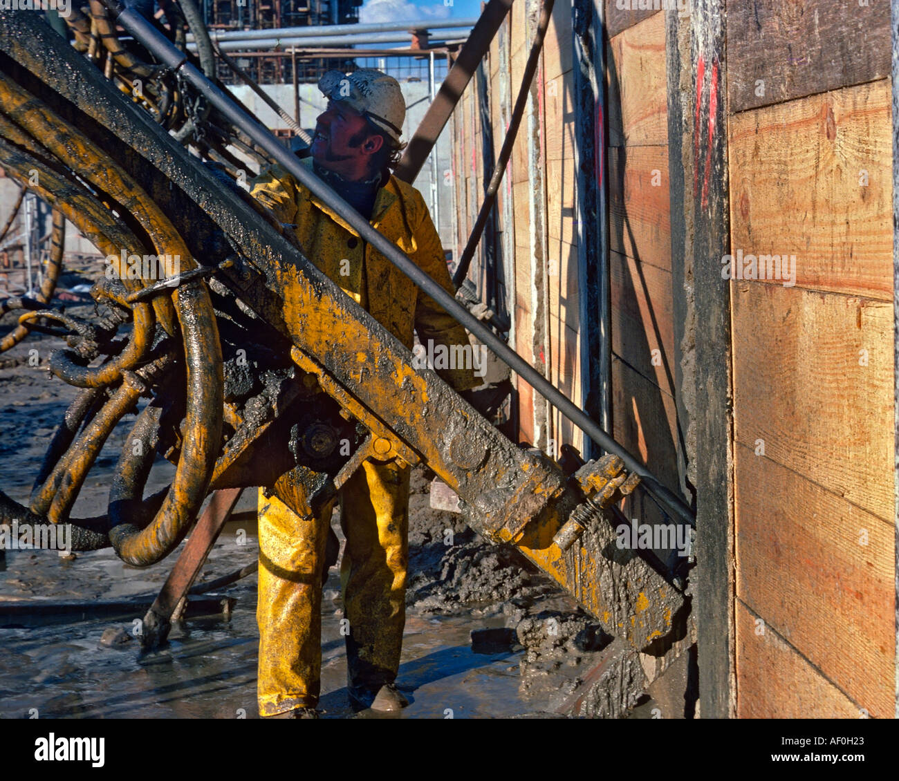 Installing tiebacks for a retaining wall Stock Photo - Alamy
