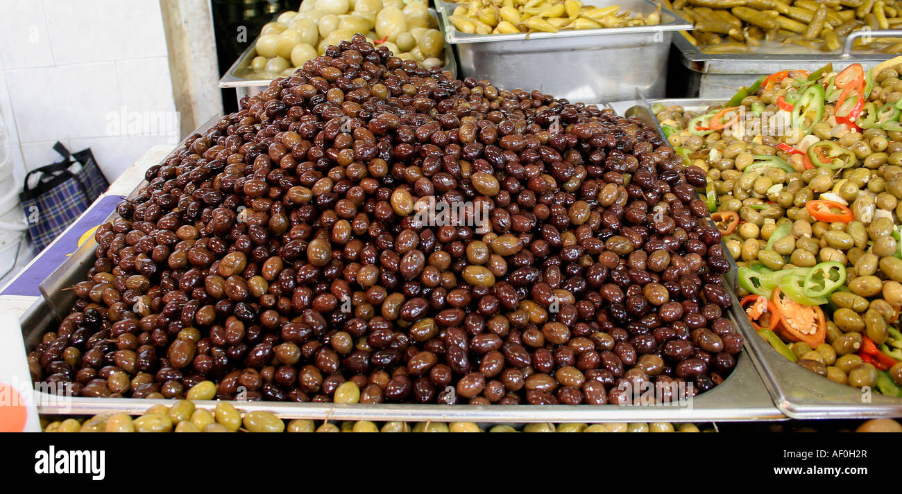 display of different olive on market Stock Photo - Alamy