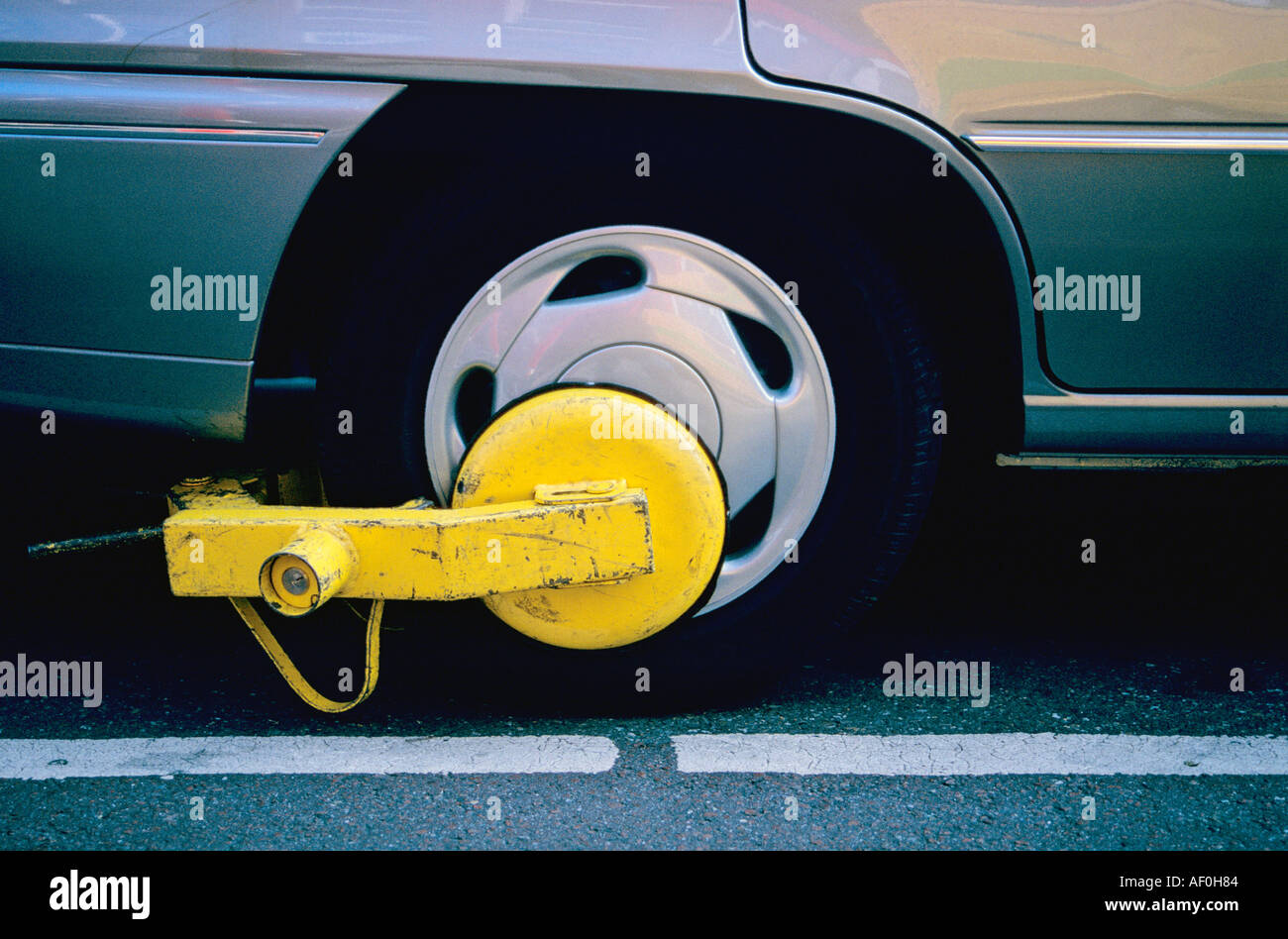 Car clamp in Amsterdam Stock Photo - Alamy