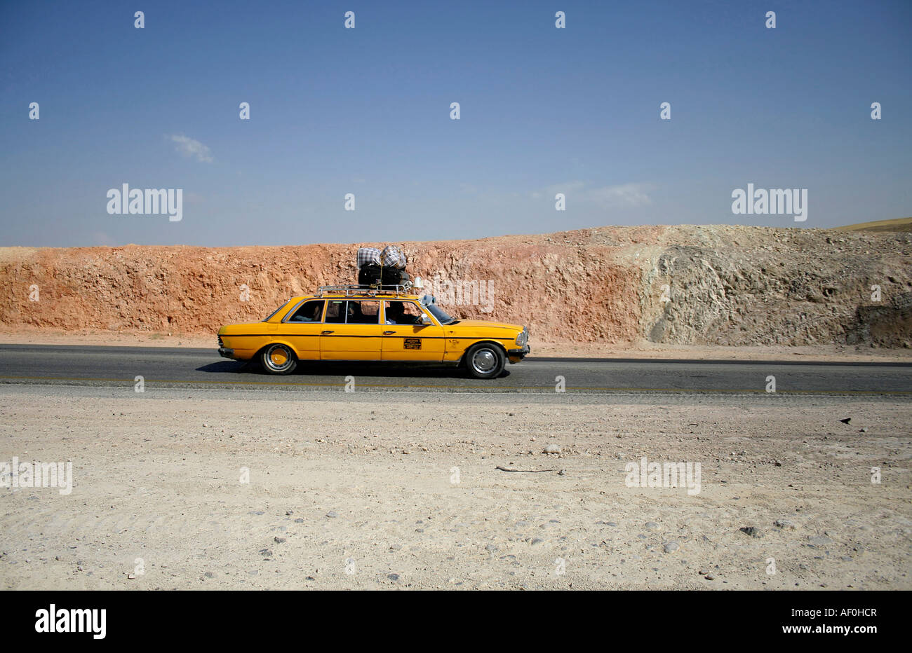 yellow arab taxi in the dead sea region Stock Photo - Alamy