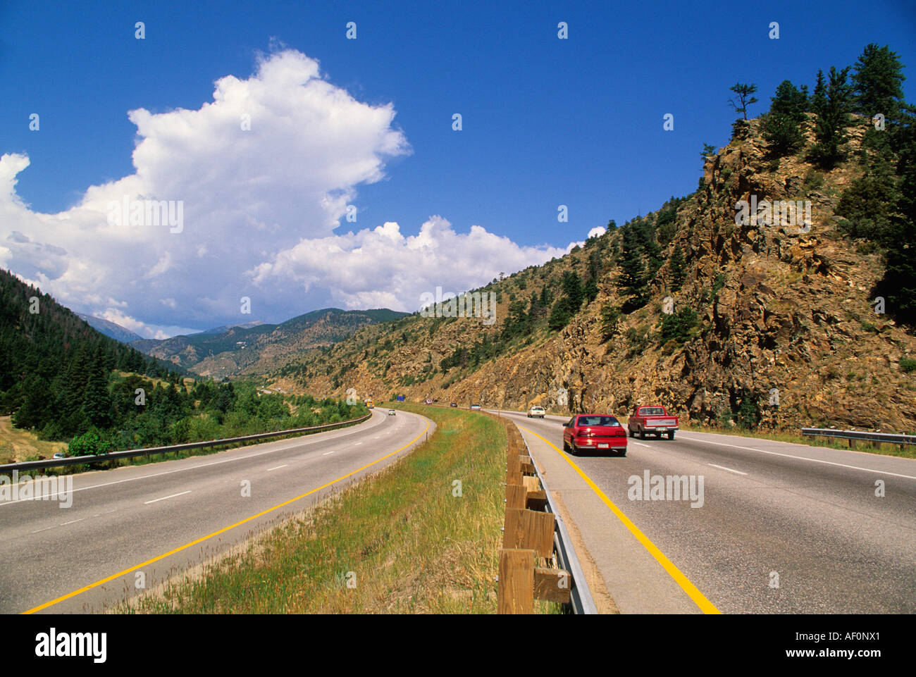 Rocky Mountain National Park highway Route I-70. Cars on mountain pass ...