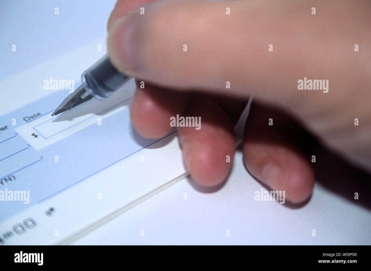 Signing cheques hi-res stock photography and images - Alamy