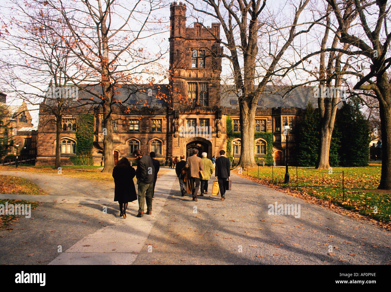 Princeton University East Pyne Hall Students and professors walking on ...