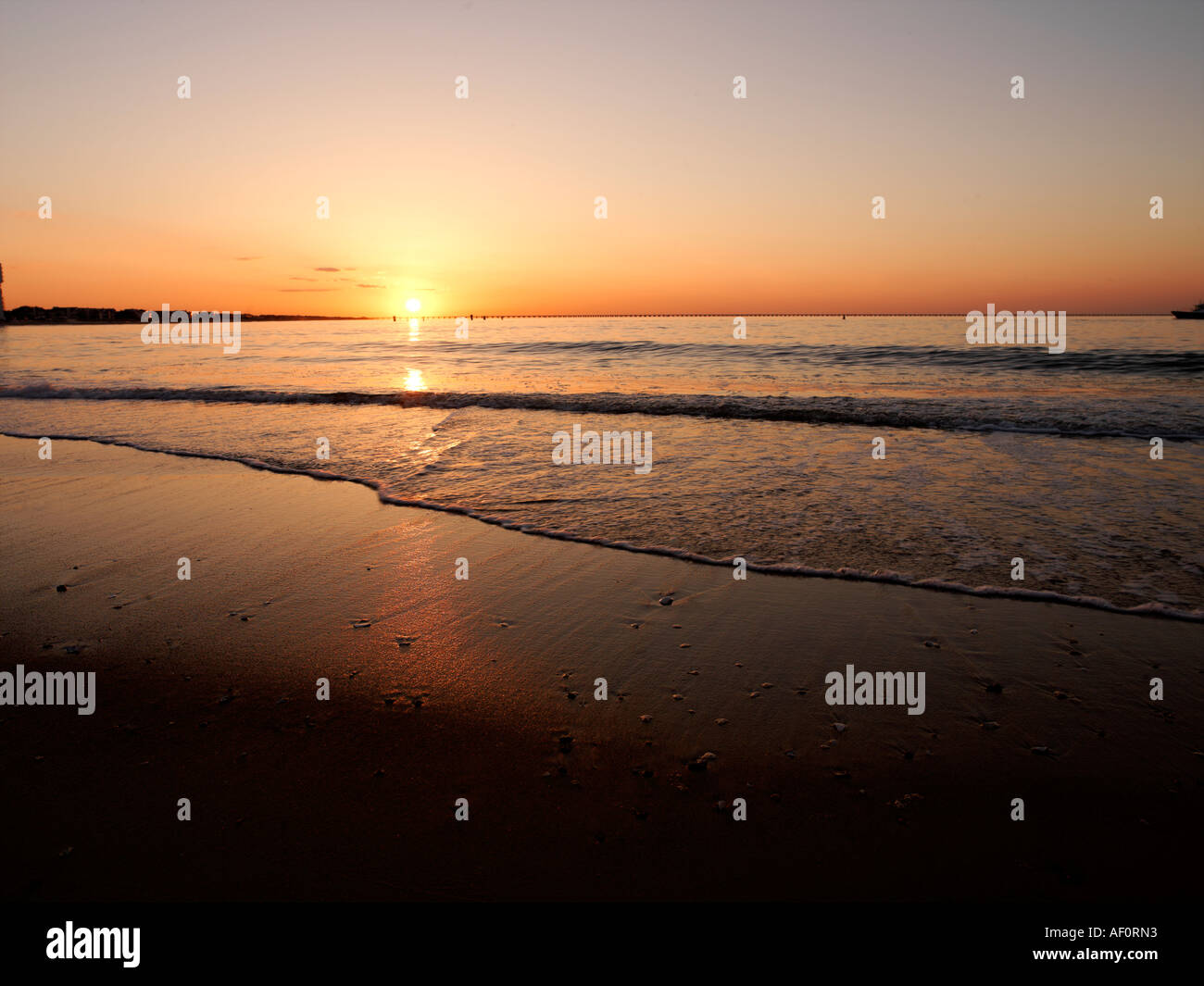 Sunset over Chesapeake Bay Bridge Tunnel bridge with beach in ...