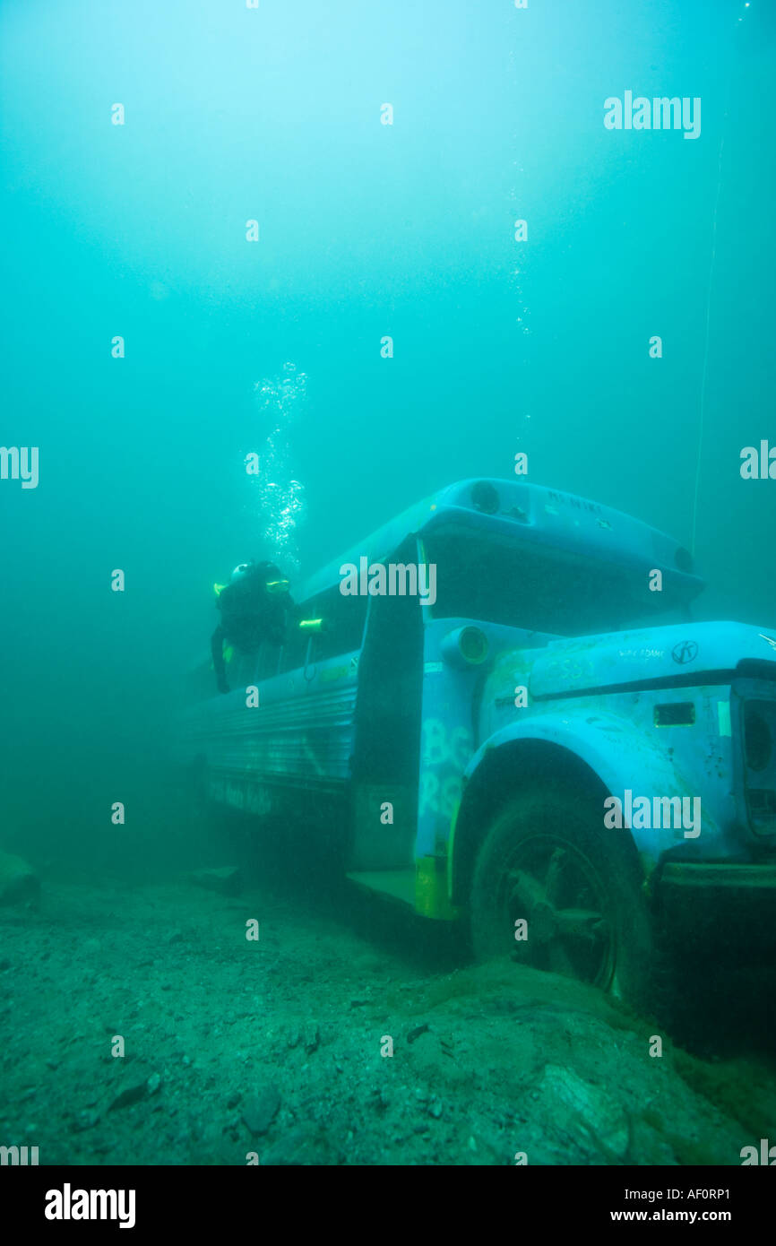 Woman scuba diver near sunken school bus Lake Rawlings Rawlings ...
