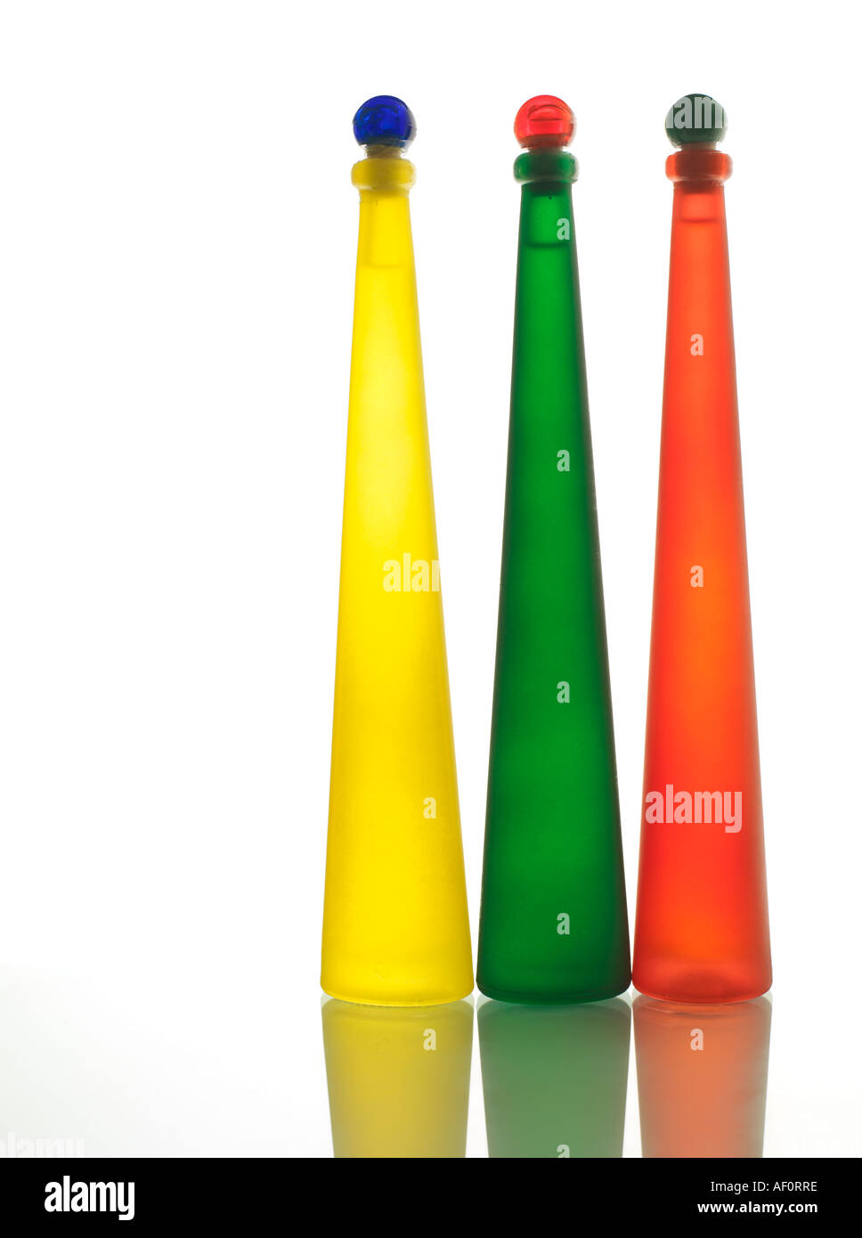 Three bottles of olive oil in frosted colored bottles Stock Photo - Alamy