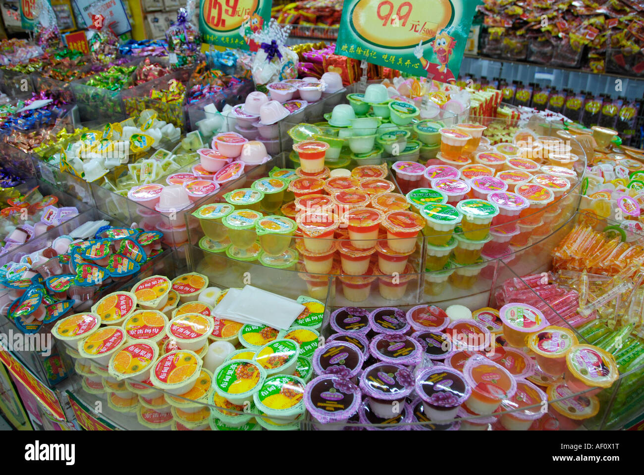 A colorful display of jelly and puddings at a grocery store in Changsha ...