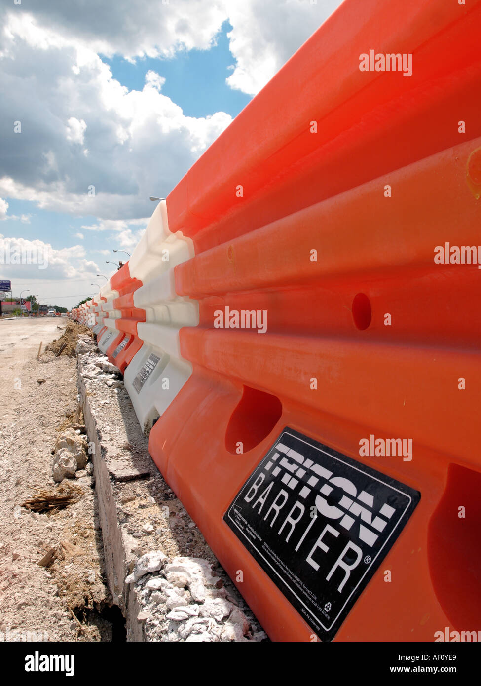 Construction barriers along an urban street Stock Photo - Alamy