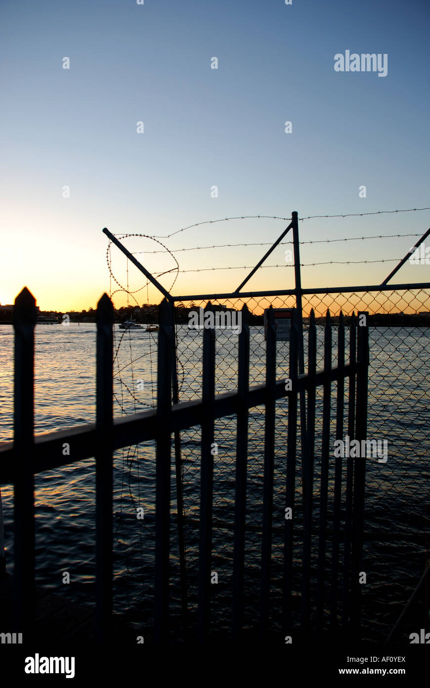 Security fence port bay dock hi-res stock photography and images - Alamy