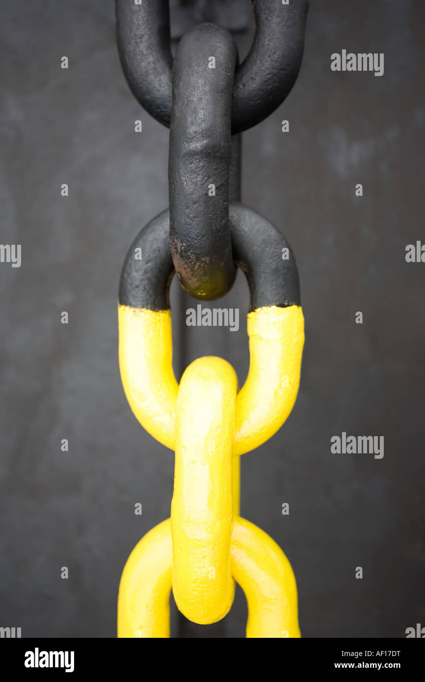 black and yellow iron chain Stock Photo - Alamy