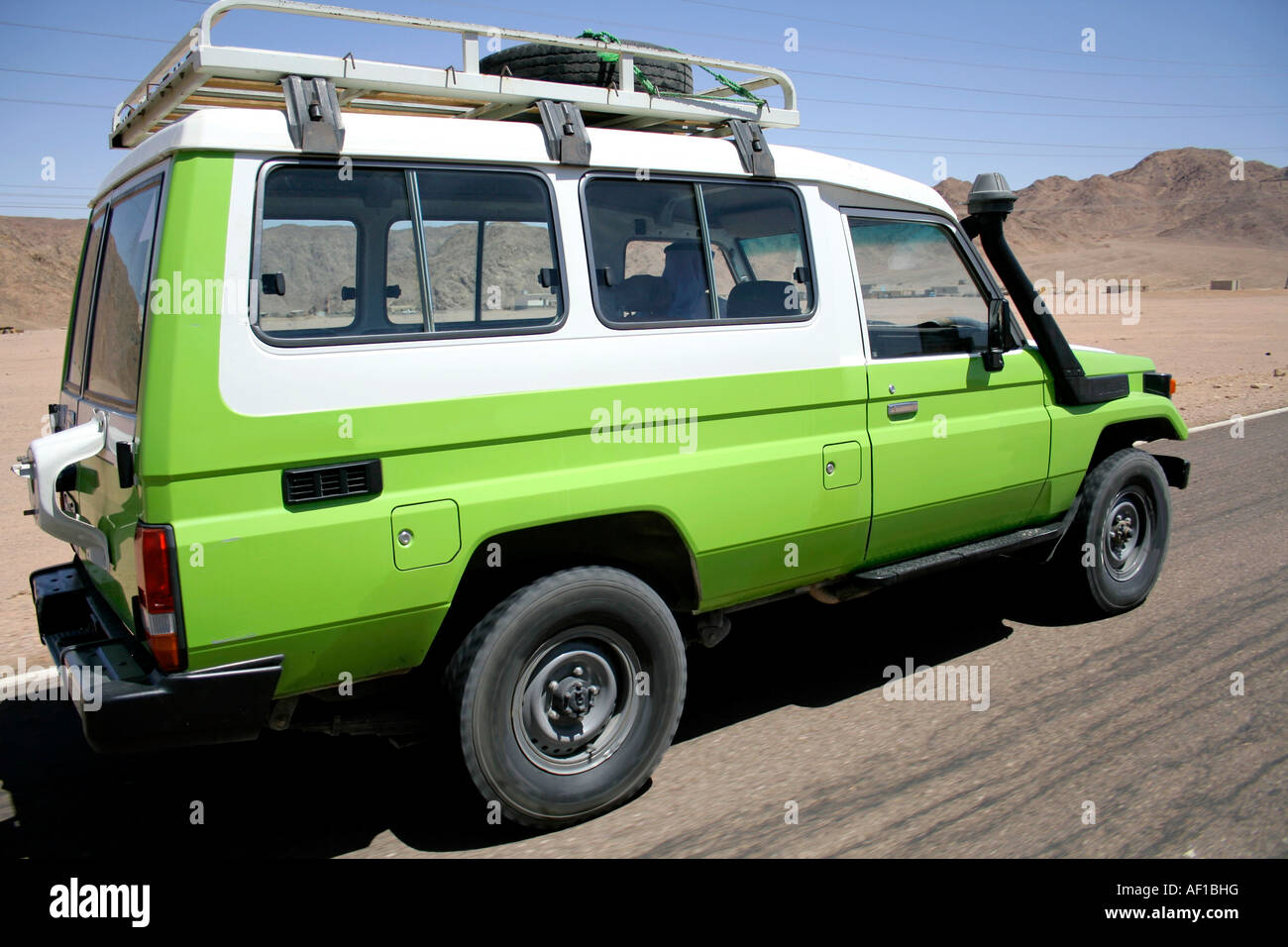 4 wheel drive overtaking on a desert road in sinai egypt Stock Photo ...