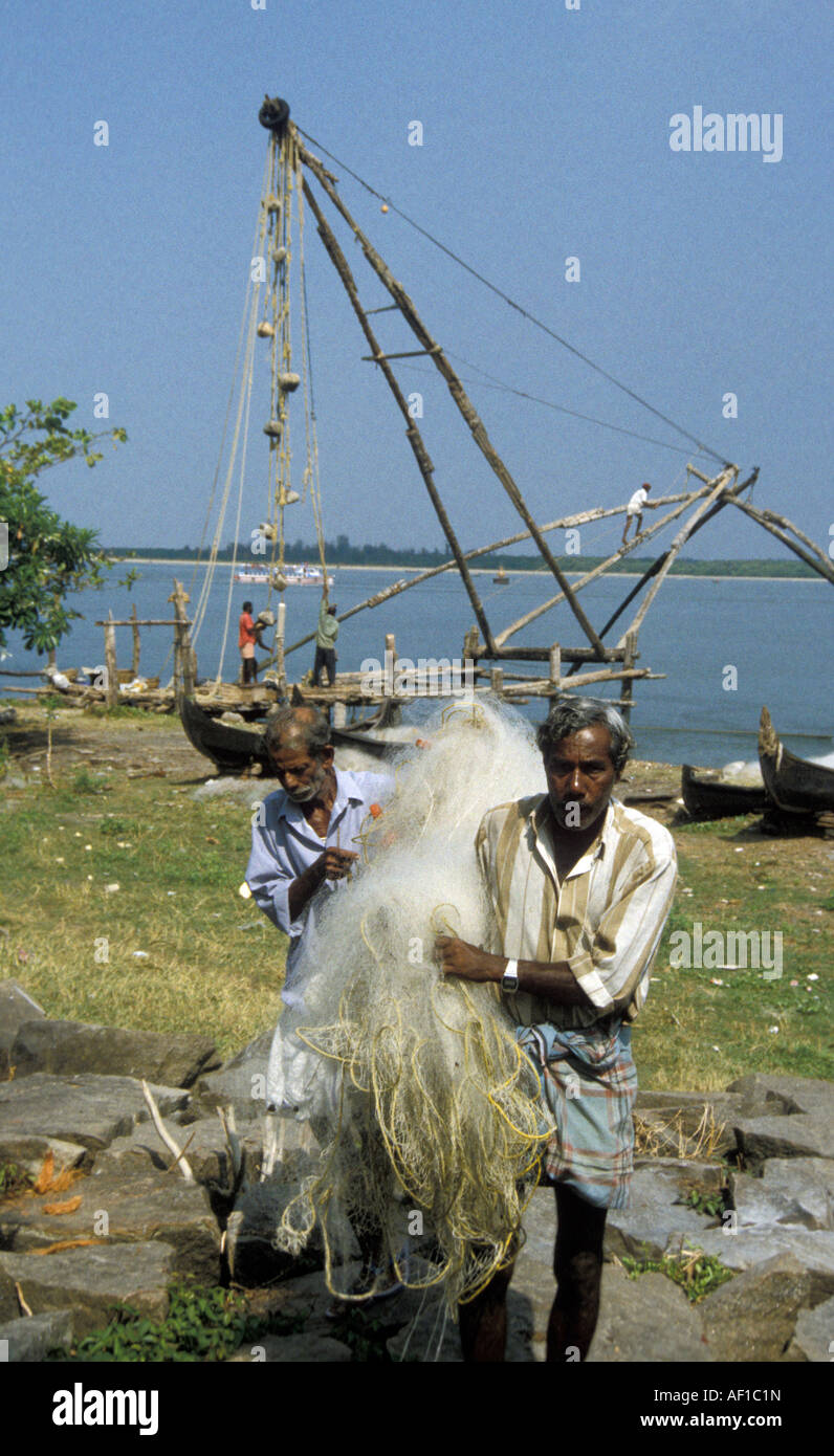 South India Kerala Kochin Fishing Village Fishermen Boats and Nets ...