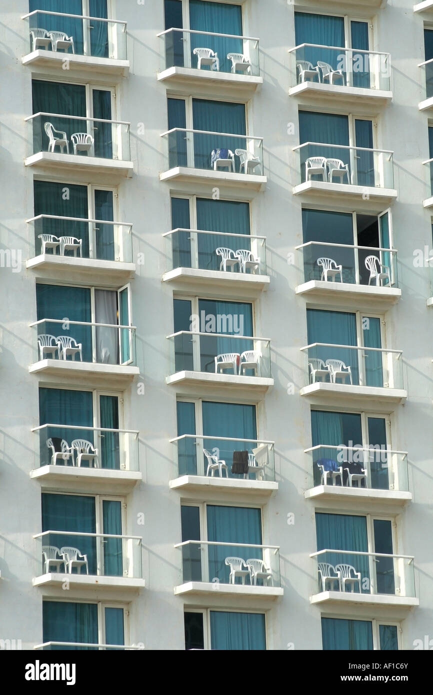 multiple window pattern on hotel facade Stock Photo - Alamy