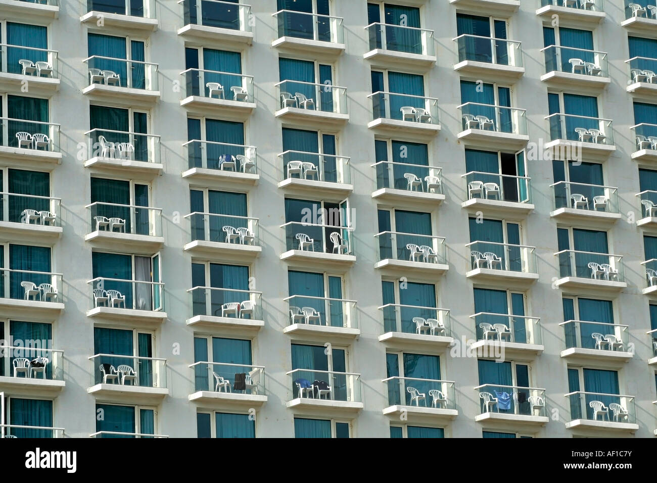 multiple window pattern on hotel facade Stock Photo - Alamy