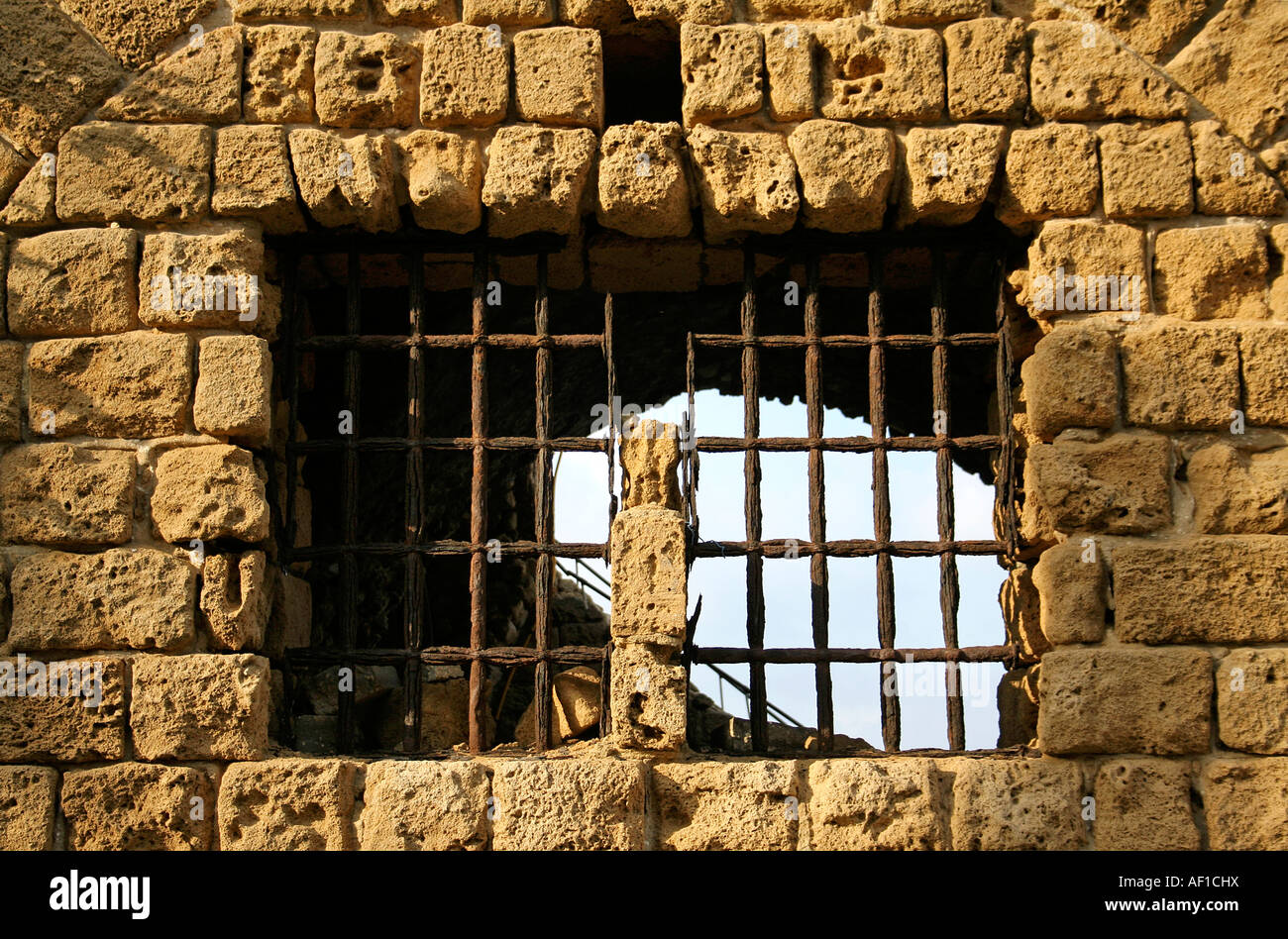 old window with grill in fortress akko israel Stock Photo - Alamy