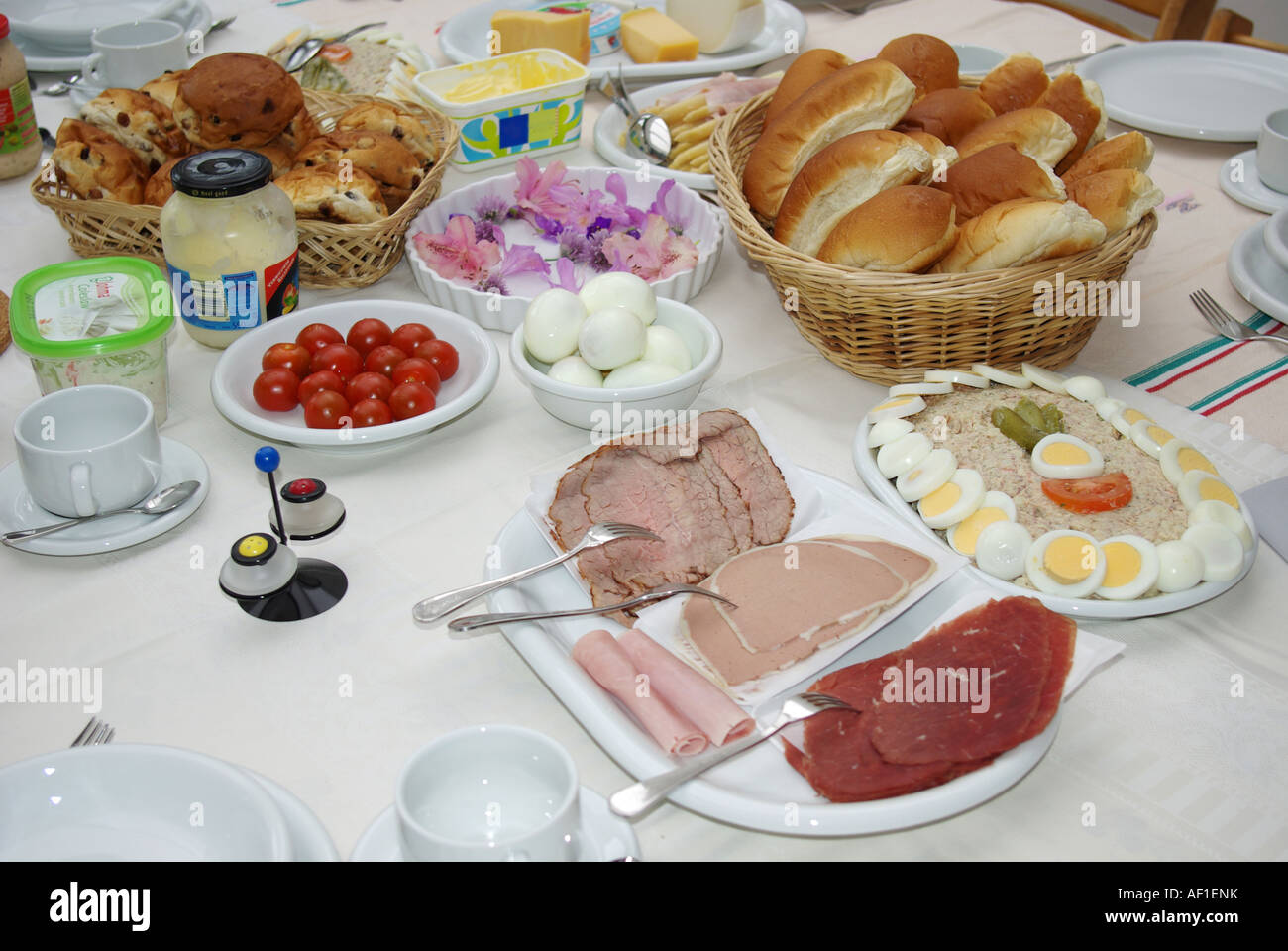 continental breakfast table with eggs and bread rolls Stock Photo - Alamy
