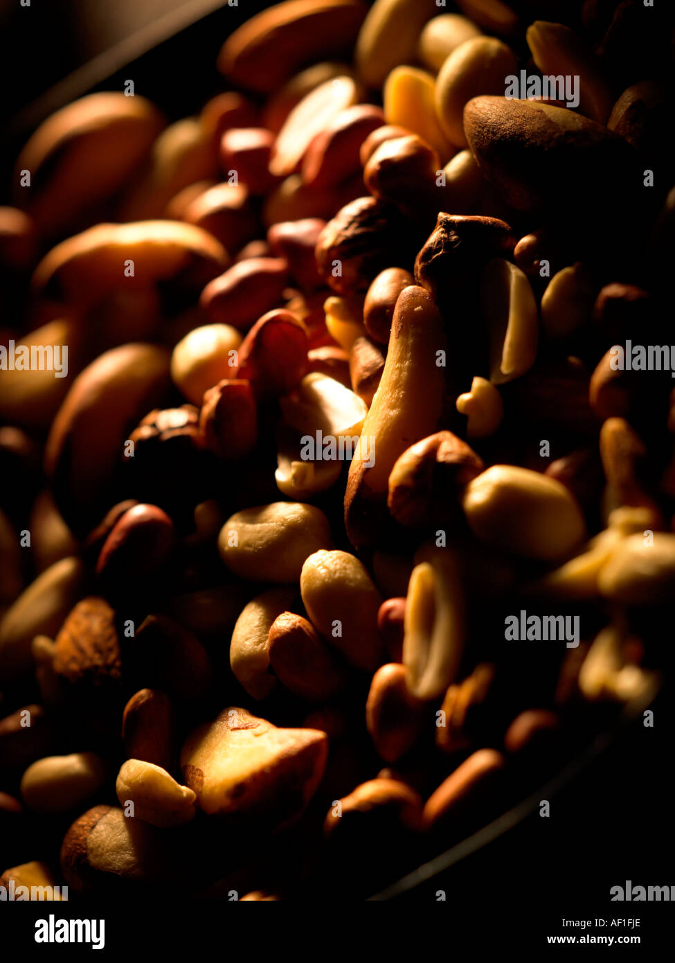 Landscape shot of various nuts including peanuts brazil nuts hazelnuts ...