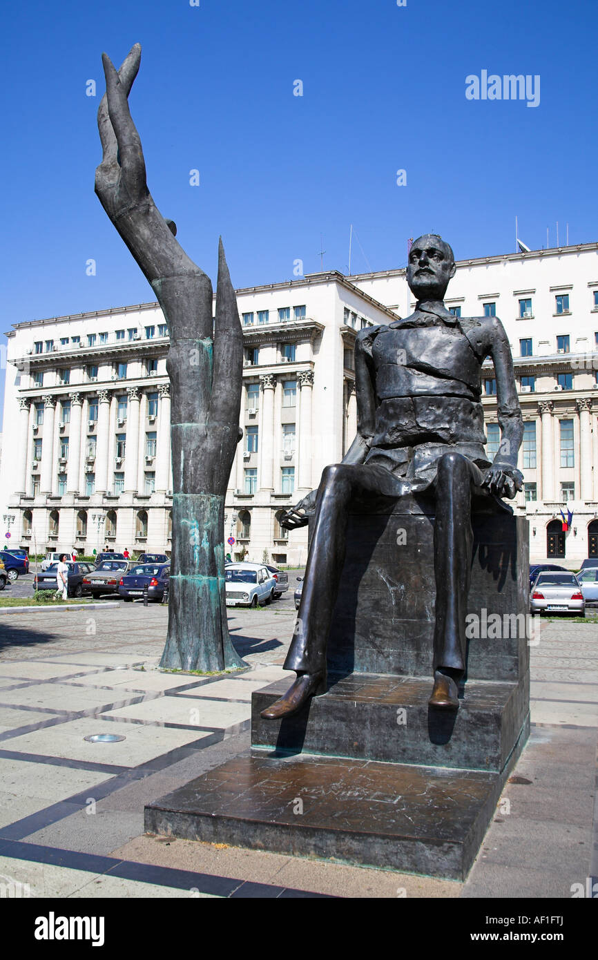 Statue of Iuliu Maniu and broken man sculpture, Piata Revolutiei ...