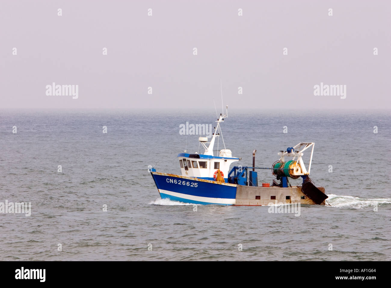 Normandy fishing boat returns to port after a succesful day scallop ...