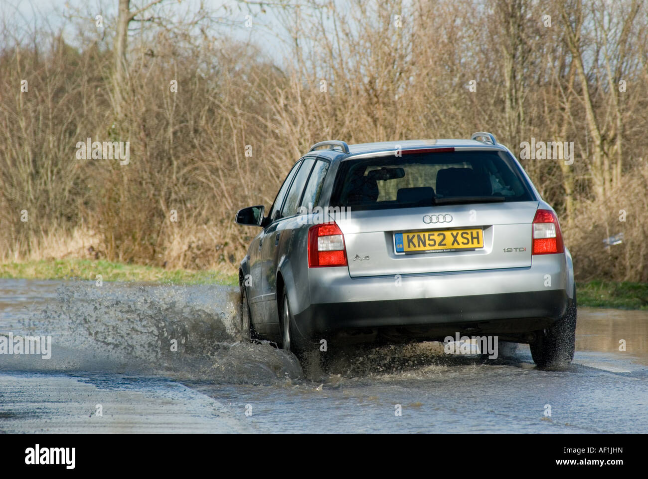 A car driving through flood water hi-res stock photography and images ...